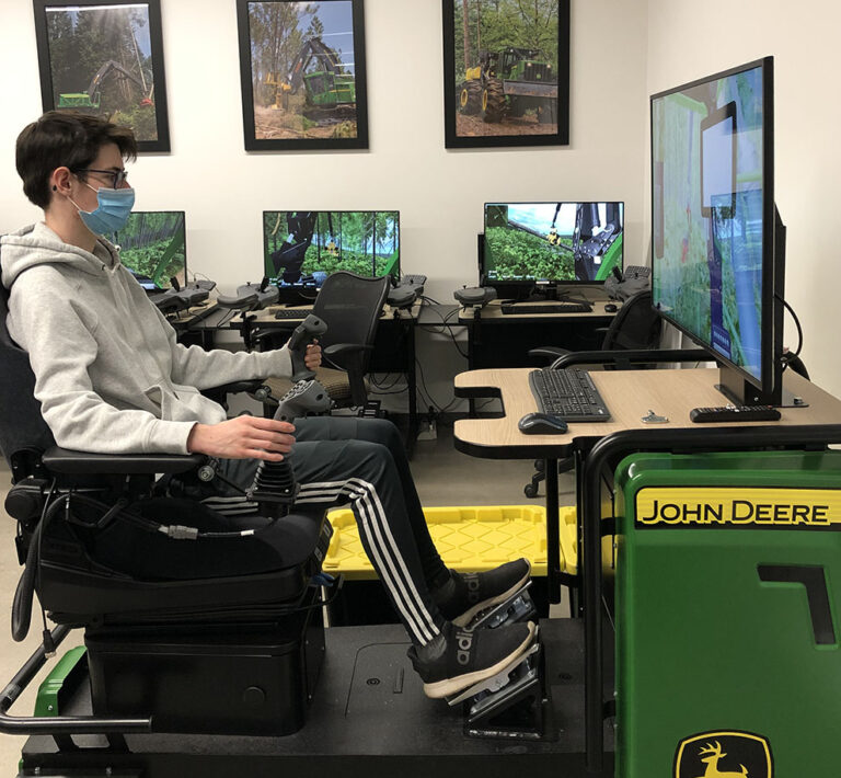 New mechanized harvesting simulators help high school students explore ...